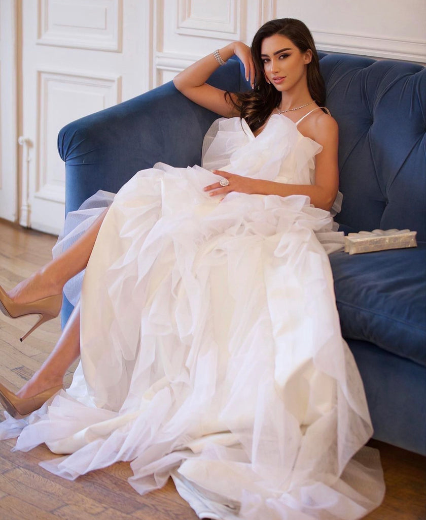 Sofia Saidi carries the new 'Lou Lou' during Paris Fashion Week – Emm Kuo